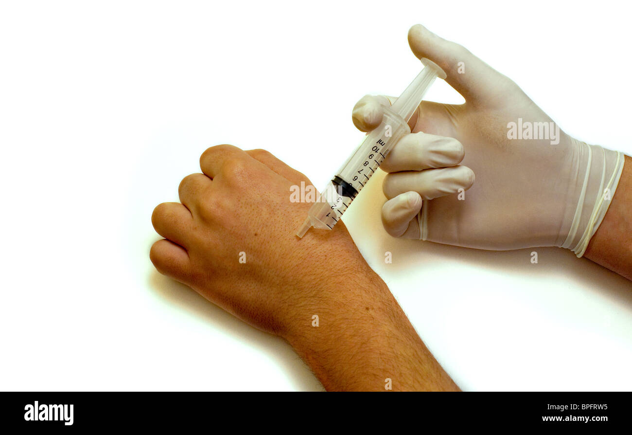 Syringe injection isolated on a white background Stock Photo - Alamy