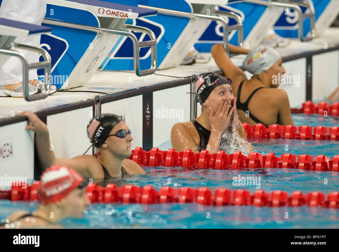 Ashley Owens of the United States (r) reacts to her world record swim ...