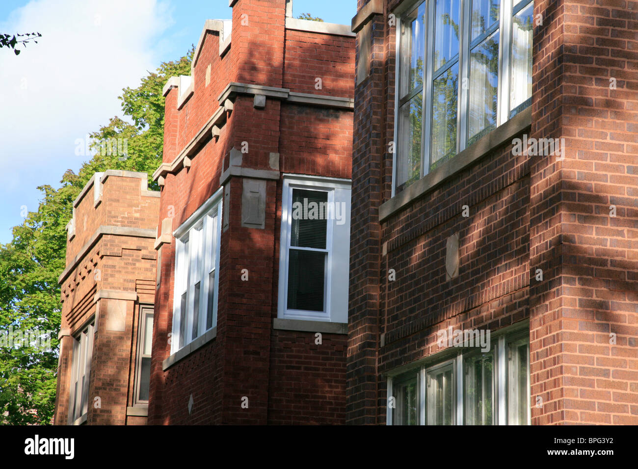 residential neighborhood city brown stone brick apartment buildings ...