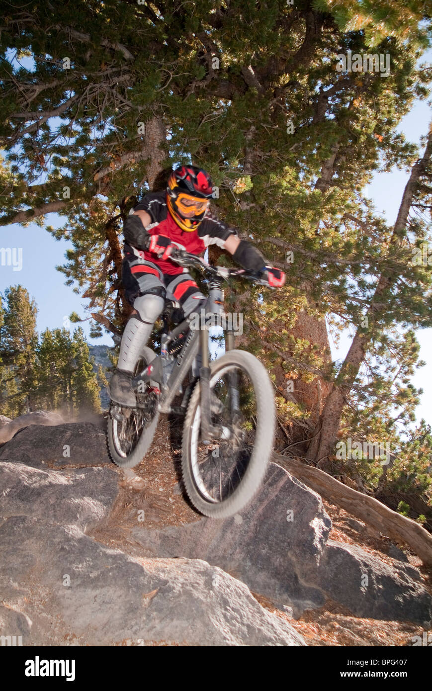 Man mountain biking and catching air Stock Photo - Alamy
