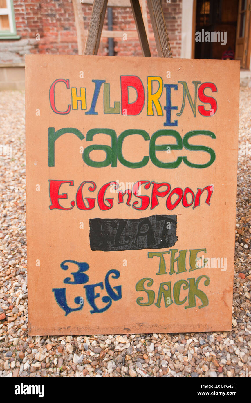 A sign advertising childrens races at a village fete in Weston ...