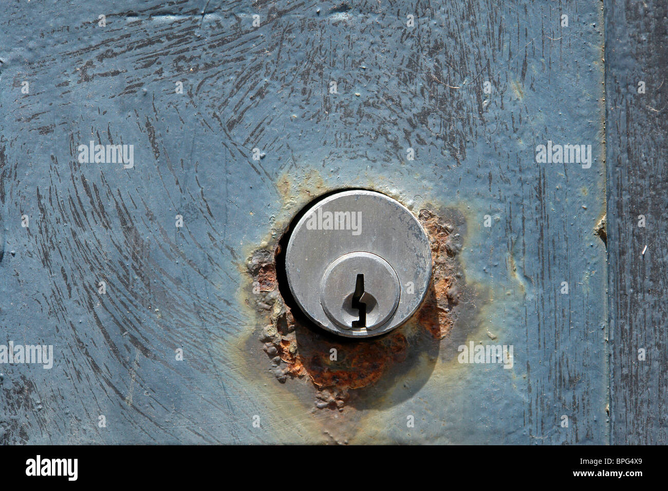 aged iron lock installed in metal door Stock Photo - Alamy