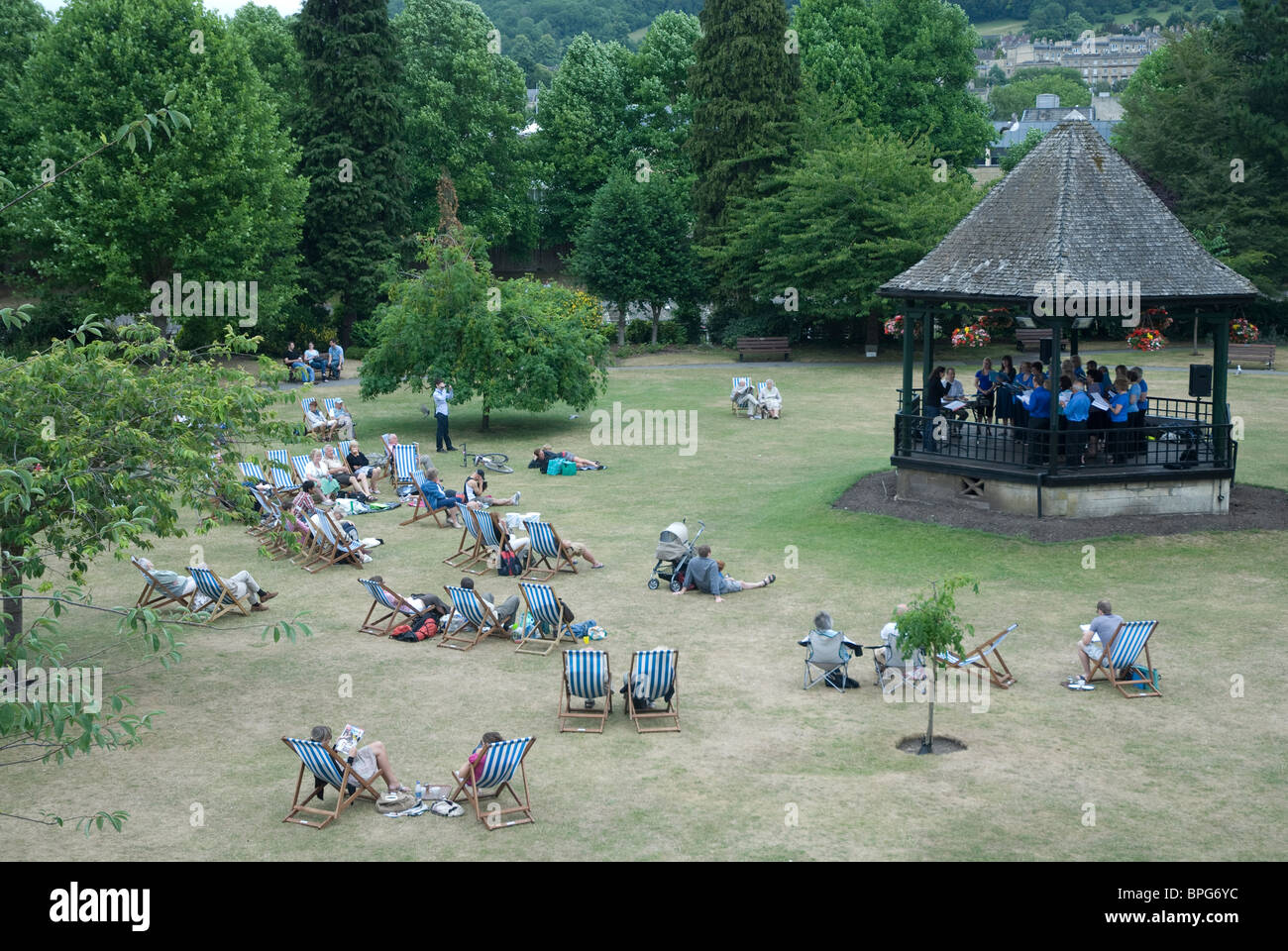 Musicians playing in the bandstand of Parade Gardens, Somerset England ...