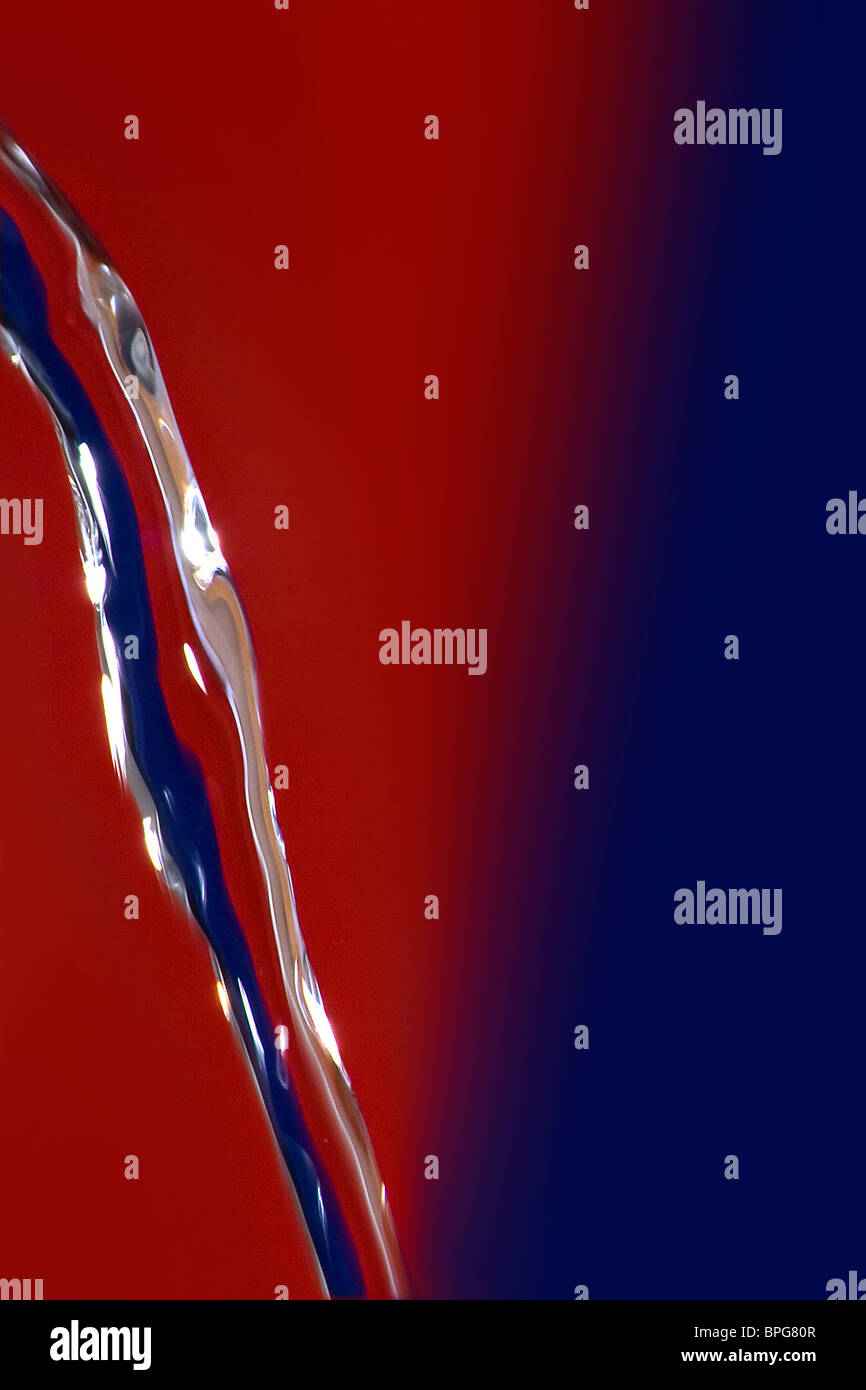 Water flowing on colorful background Stock Photo - Alamy