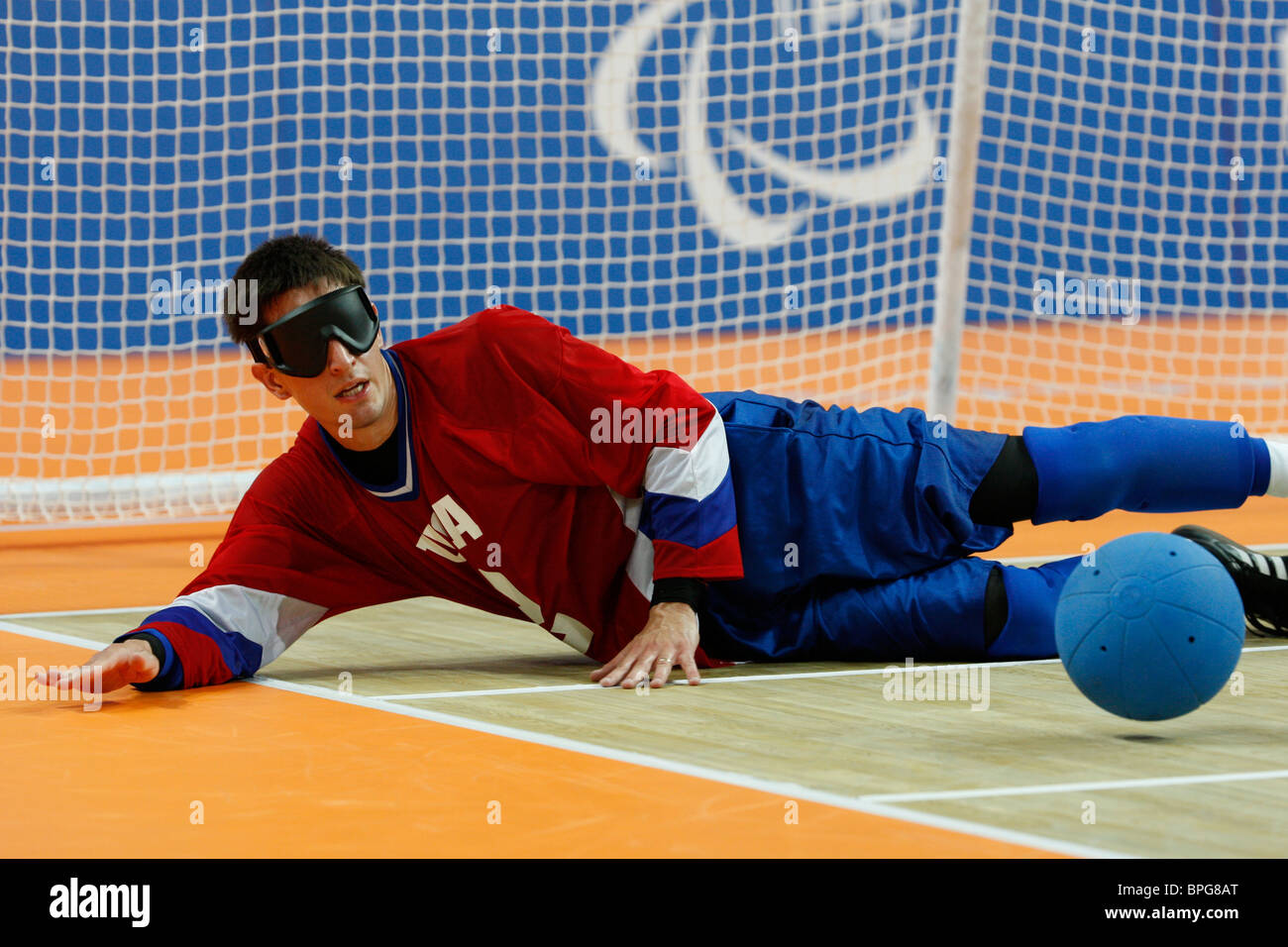 U.S. player Tyler Merren blocking a shot against Iran in men's goalball ...