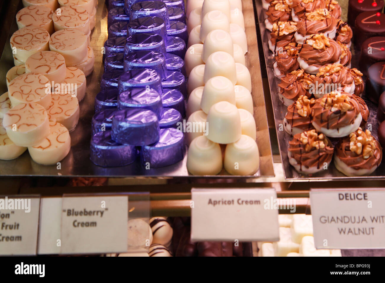 Chocolates and confectionery on a counter in a specialist upmarket shop ...