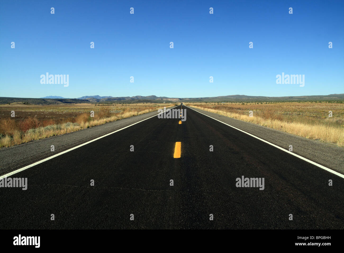 Straight desert road, Arizona, USA Stock Photo - Alamy