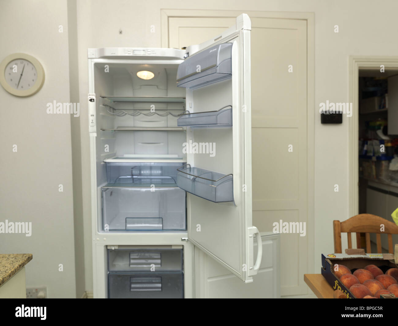 Fridge Freezer With Doors Open In The Kitchen Stock Photo - Alamy