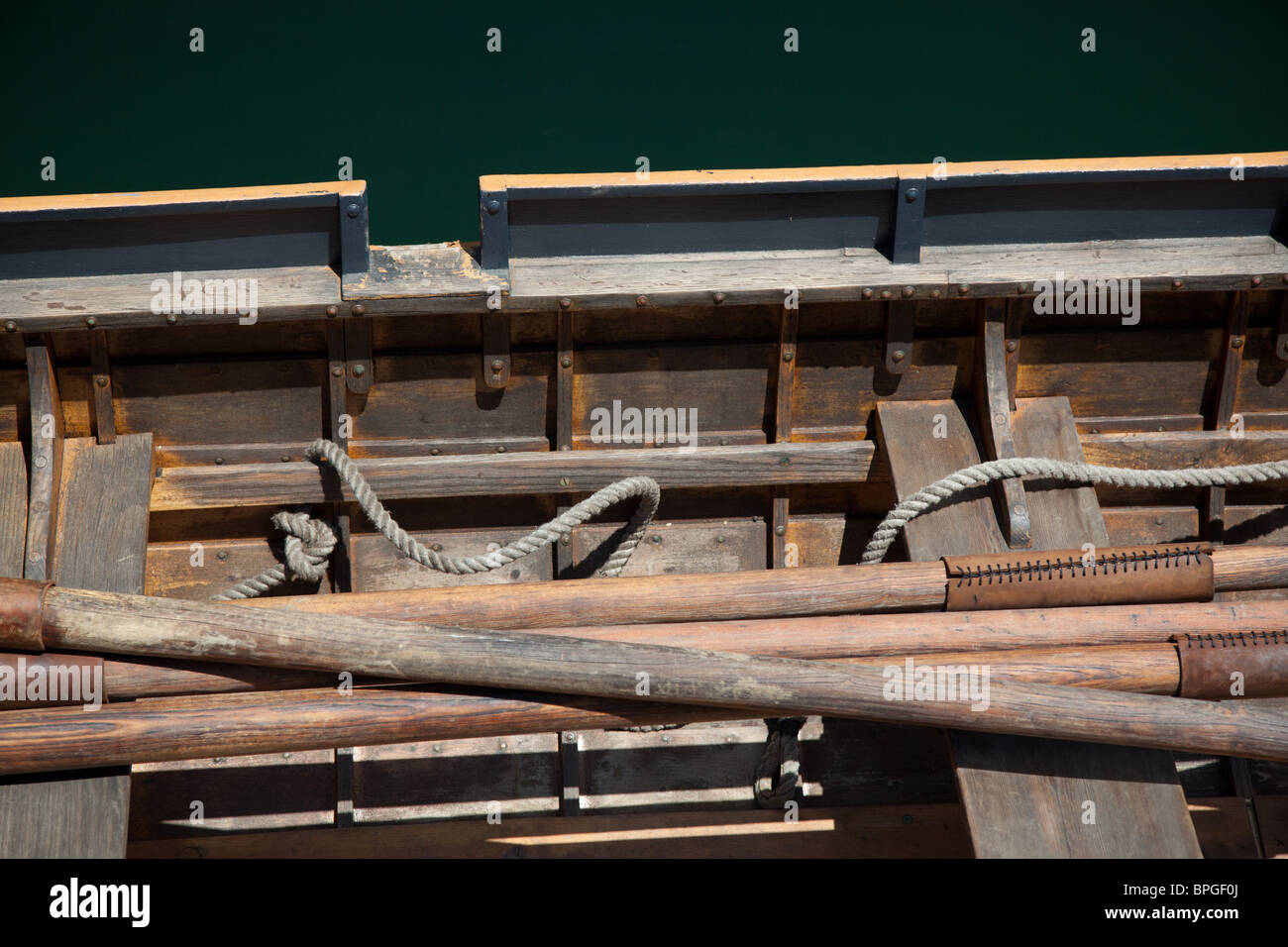 Closeup of old rowboat and oars Stock Photo - Alamy