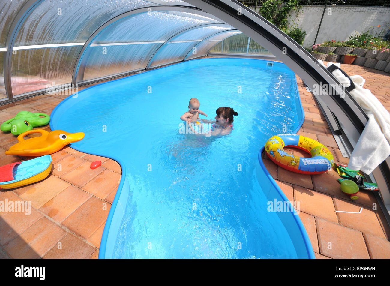 Infant swimming hi-res stock photography and images - Alamy