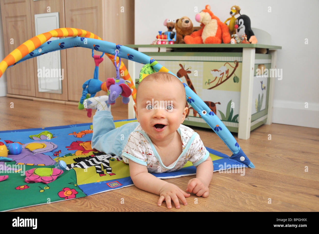 Kid on a play mat hi-res stock photography and images - Alamy