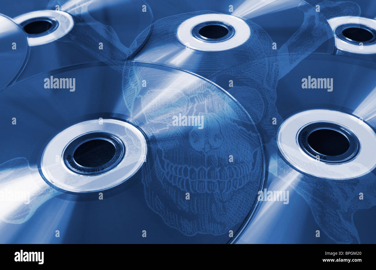 Compact discs with skull and crossbones overlayed. Concept image ...
