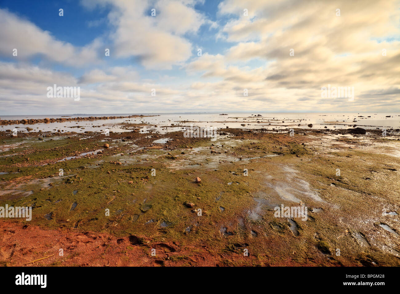 dry ocean under cloudy sky Stock Photo - Alamy