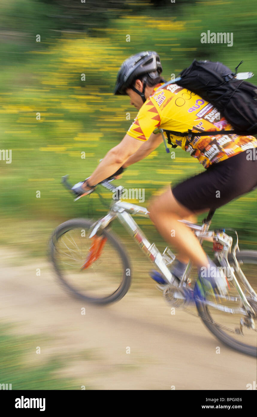 Man mountain biking in Spring Stock Photo - Alamy