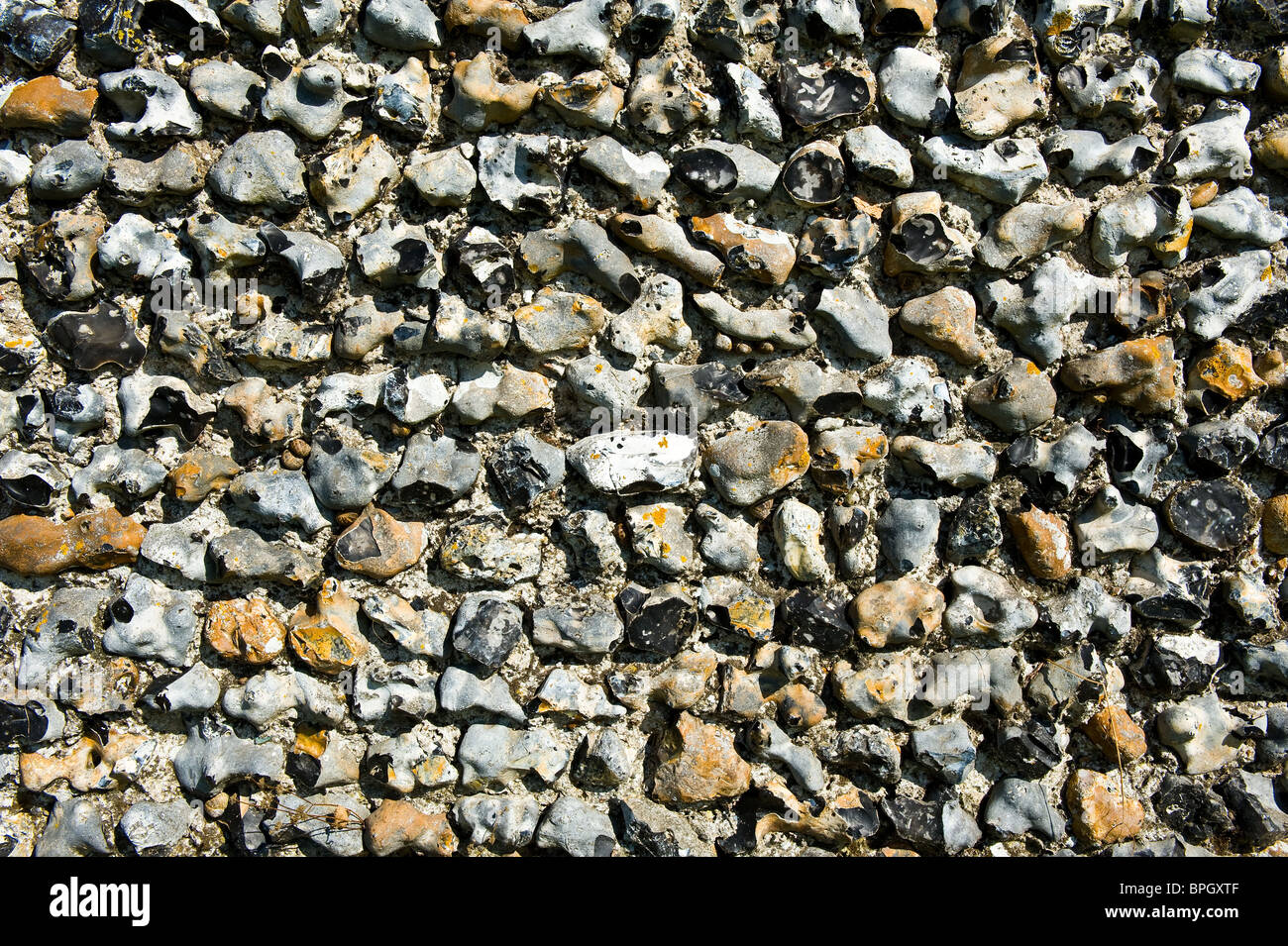 A Background Image of a Traditionally Built Flintstone Wall Stock Photo ...