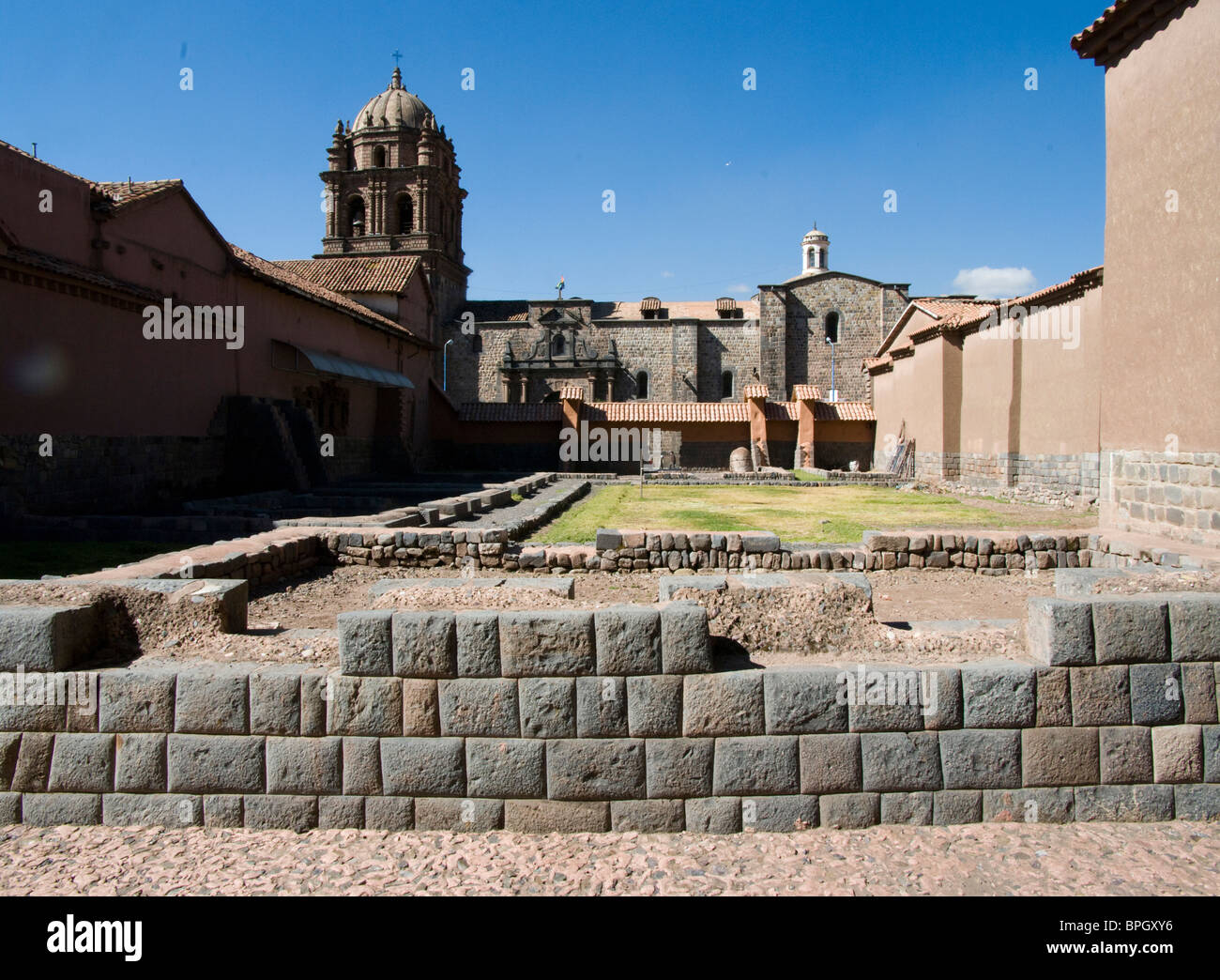 Peru. Cusco. Archeology site of Kusicancha. Inca ruins and The Church ...
