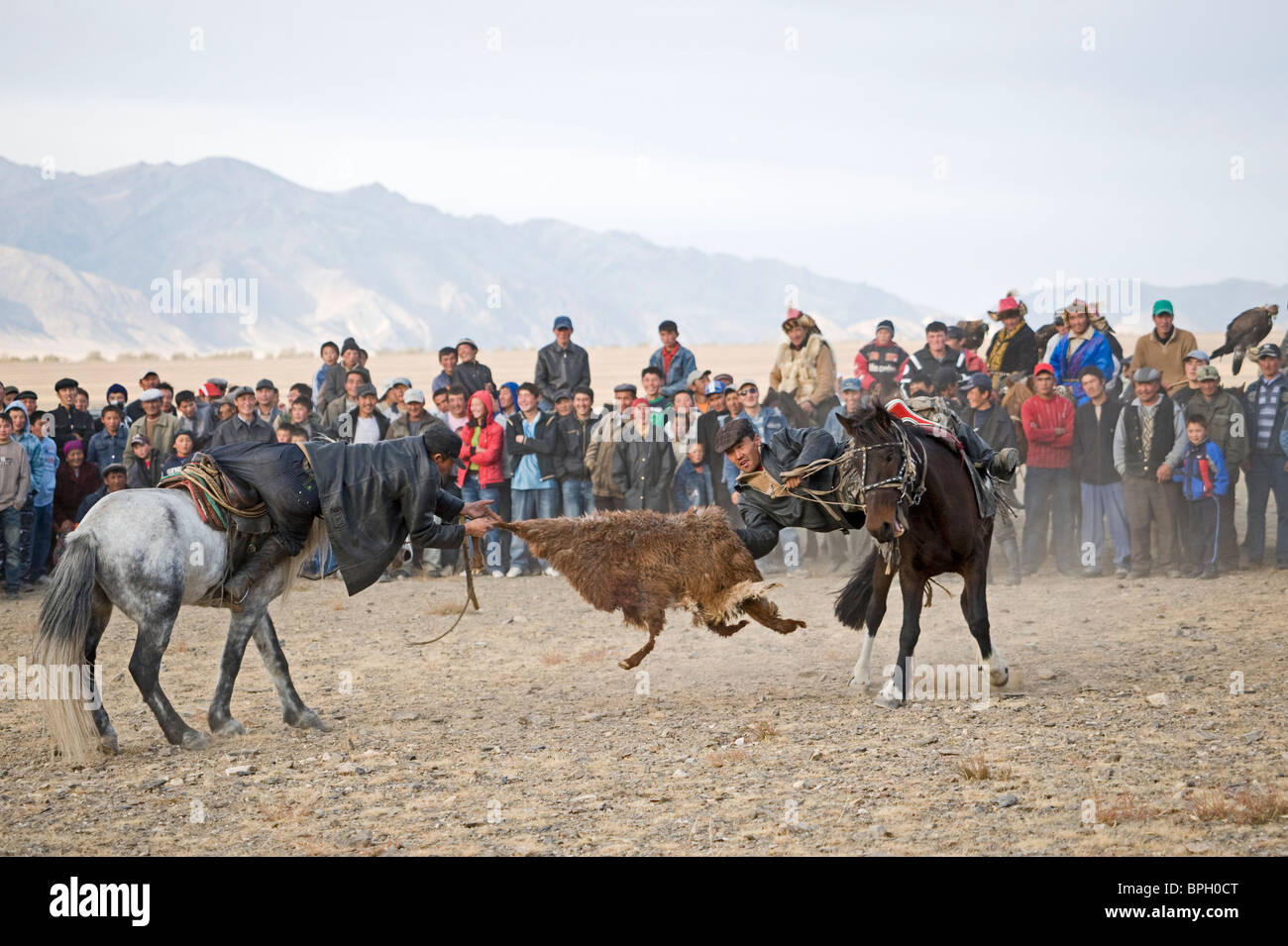 Kurbar tug of war with a goat skin at Eagle Hunters Festival Bayan Ulgi ...