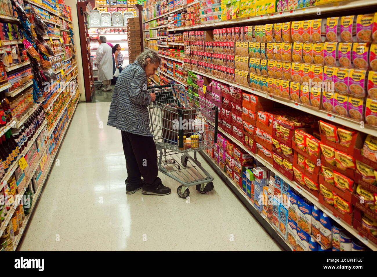 Elderly shopper in a supermarket in the New York borough of the Bronx ...