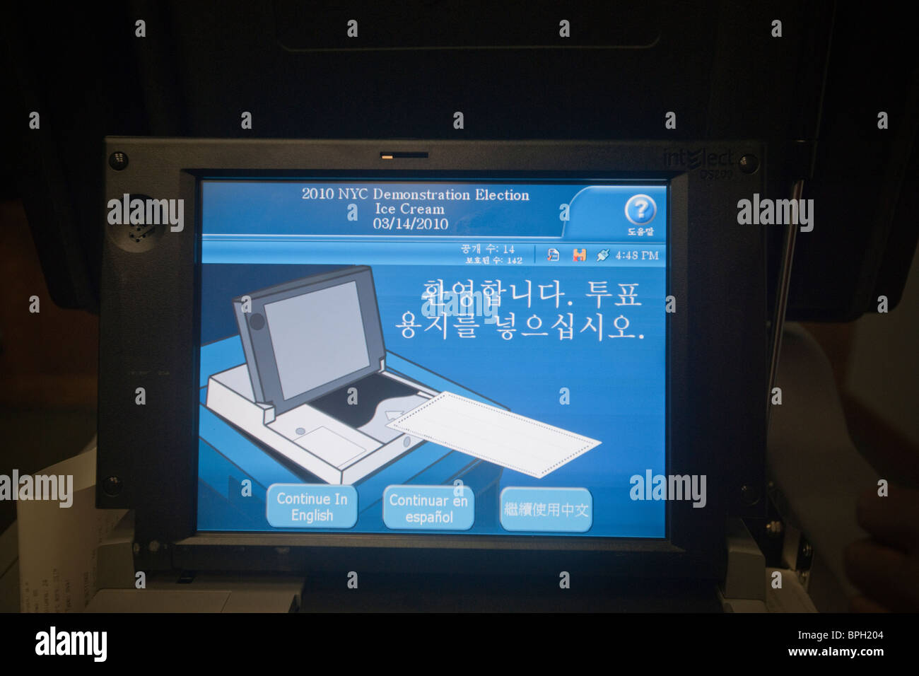 The NYC Board of Elections demonstrates an electronic voting machine ...