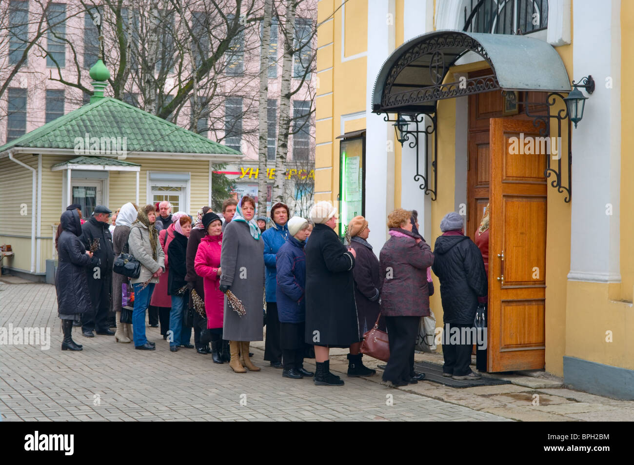 Queue from old people in church in Easter Sunday. St. Petersburg ...