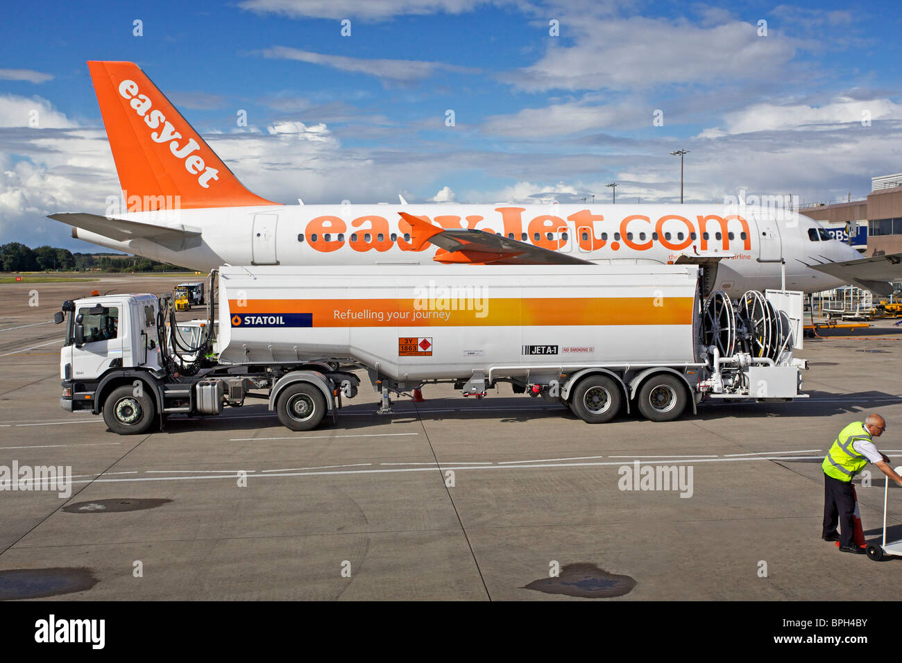 Easyjet plane refueling on the tarmac at Edinburgh airport, Scotland ...