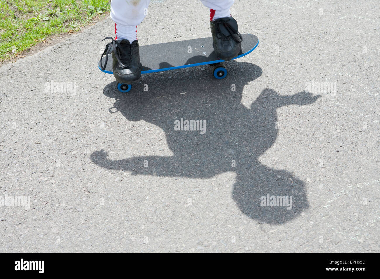 Low section view of a boy skateboarding, Boston, Suffolk County ...