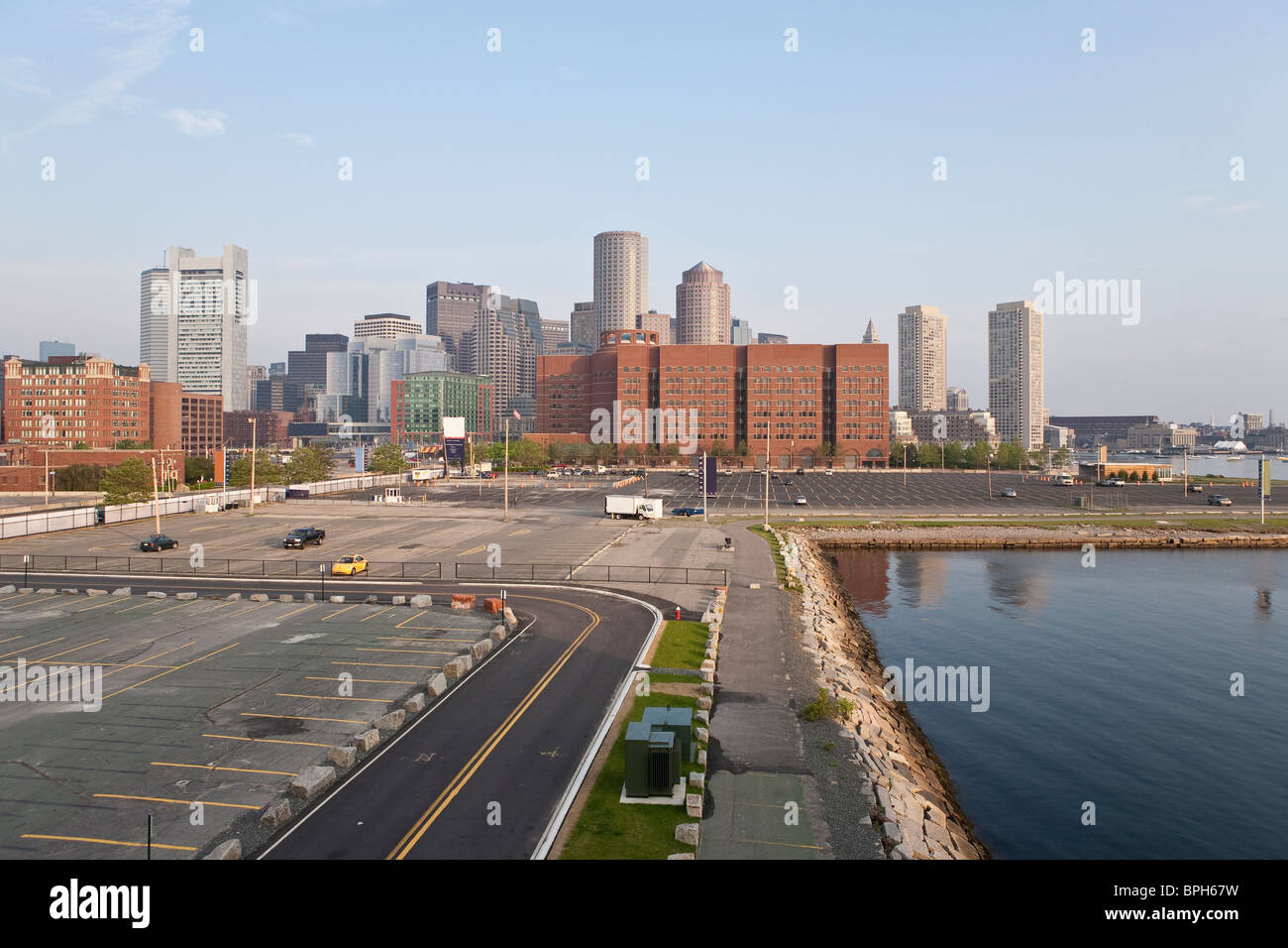 Federal courthouse with financial district on a harbor, Boston Harbor ...