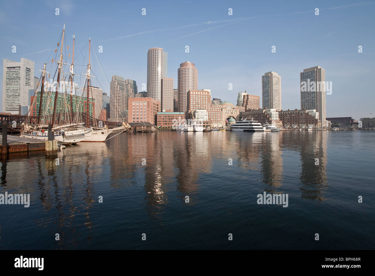 Boats with financial district on a harbor, Rowes Wharf, Boston Harbor ...