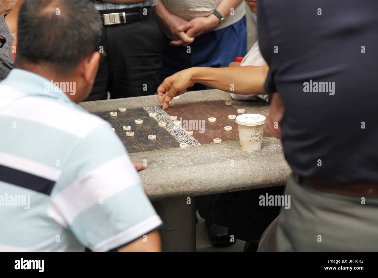 Men playing games, Chinatown in New York Stock Photo - Alamy