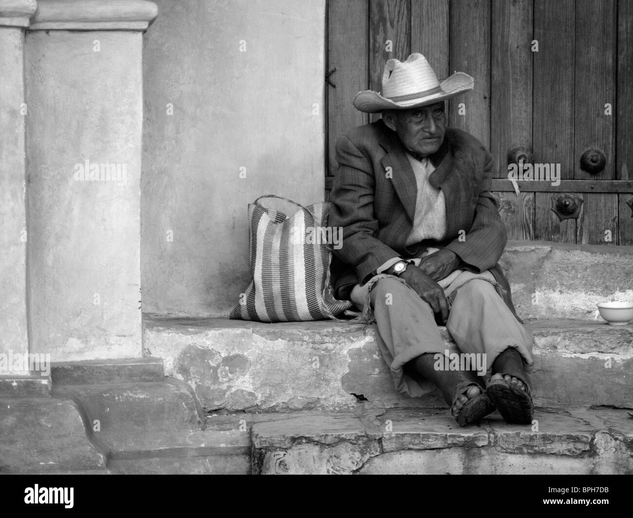 Senior man sits outside church hi-res stock photography and images - Alamy