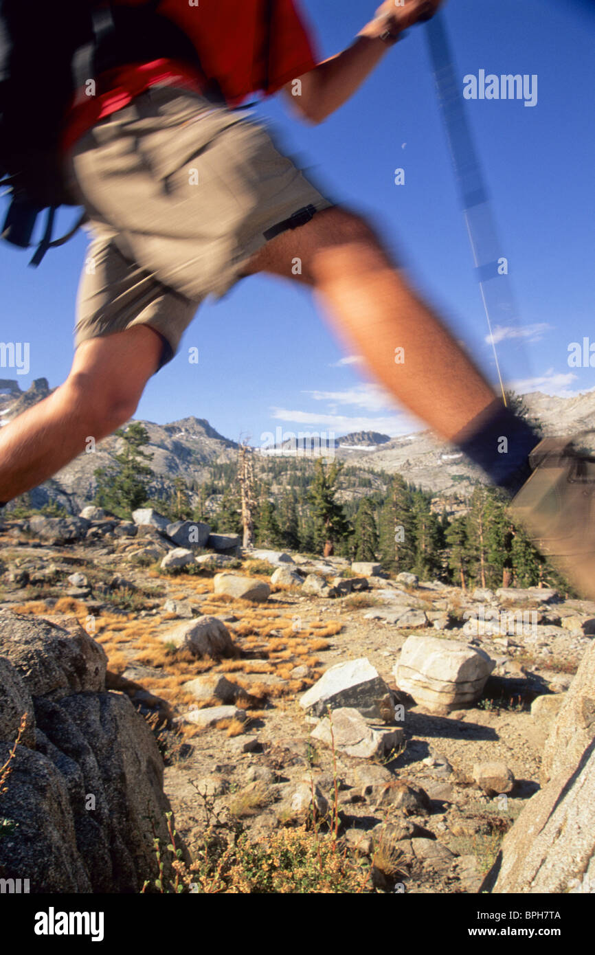 Man hiking over rocks Stock Photo - Alamy