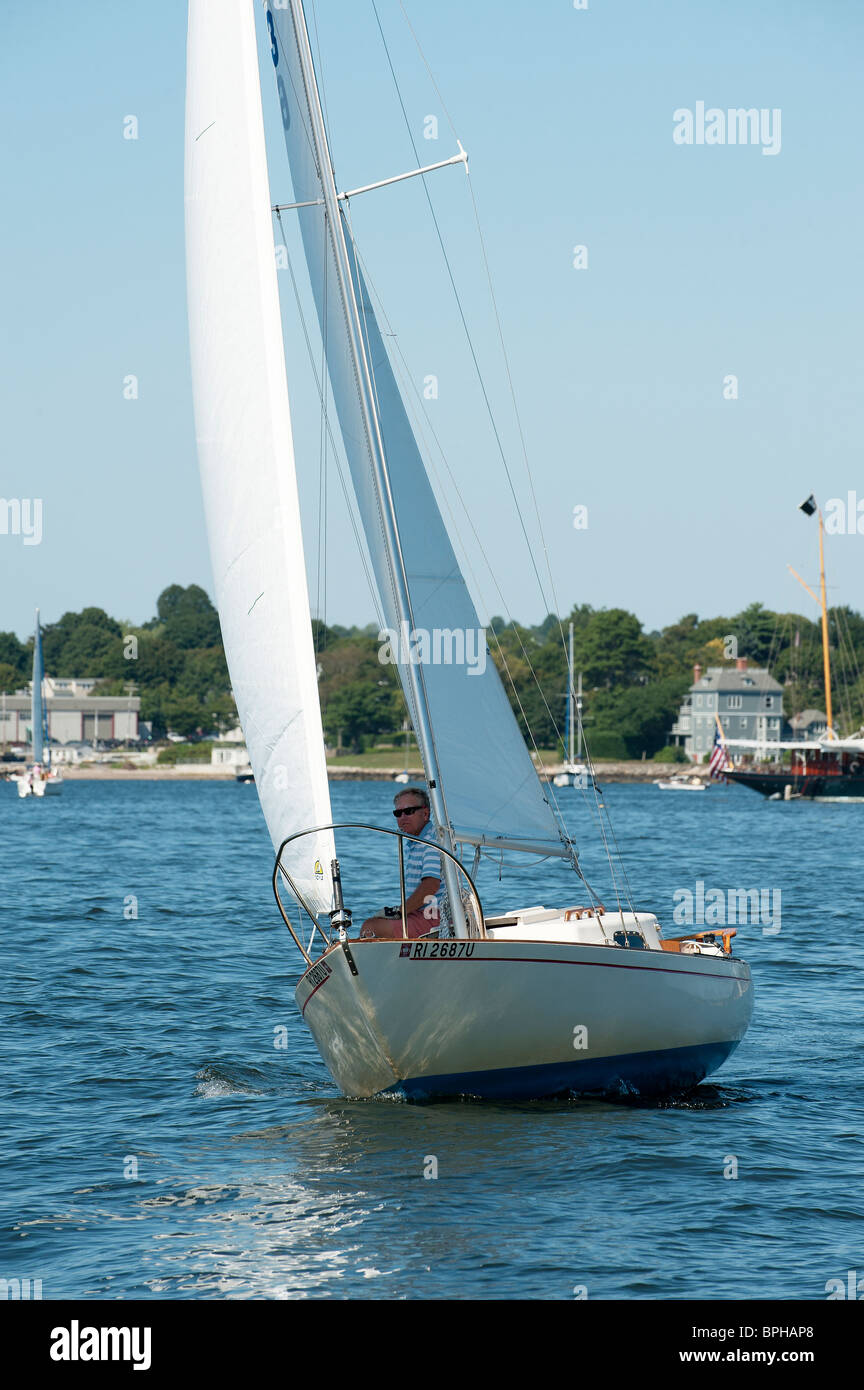 small boat sailing Stock Photo - Alamy