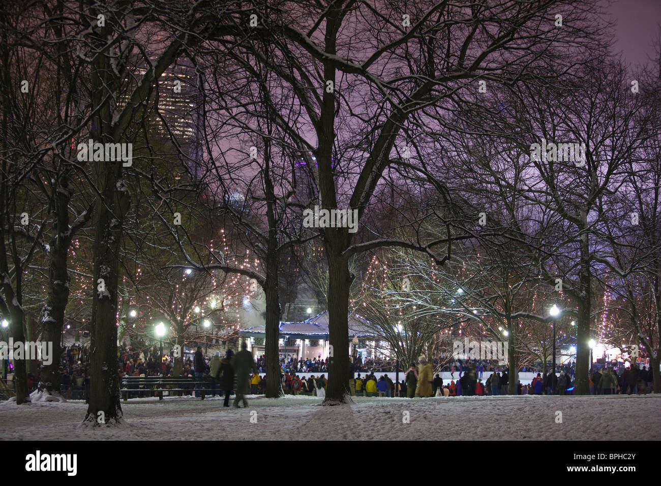 People at an ice rink on new year's eve, Frog Pond, Boston Common ...