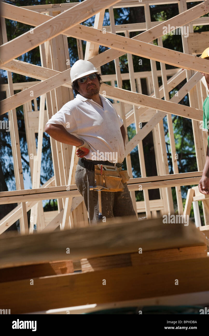 Carpenters standing at the construction site Stock Photo - Alamy