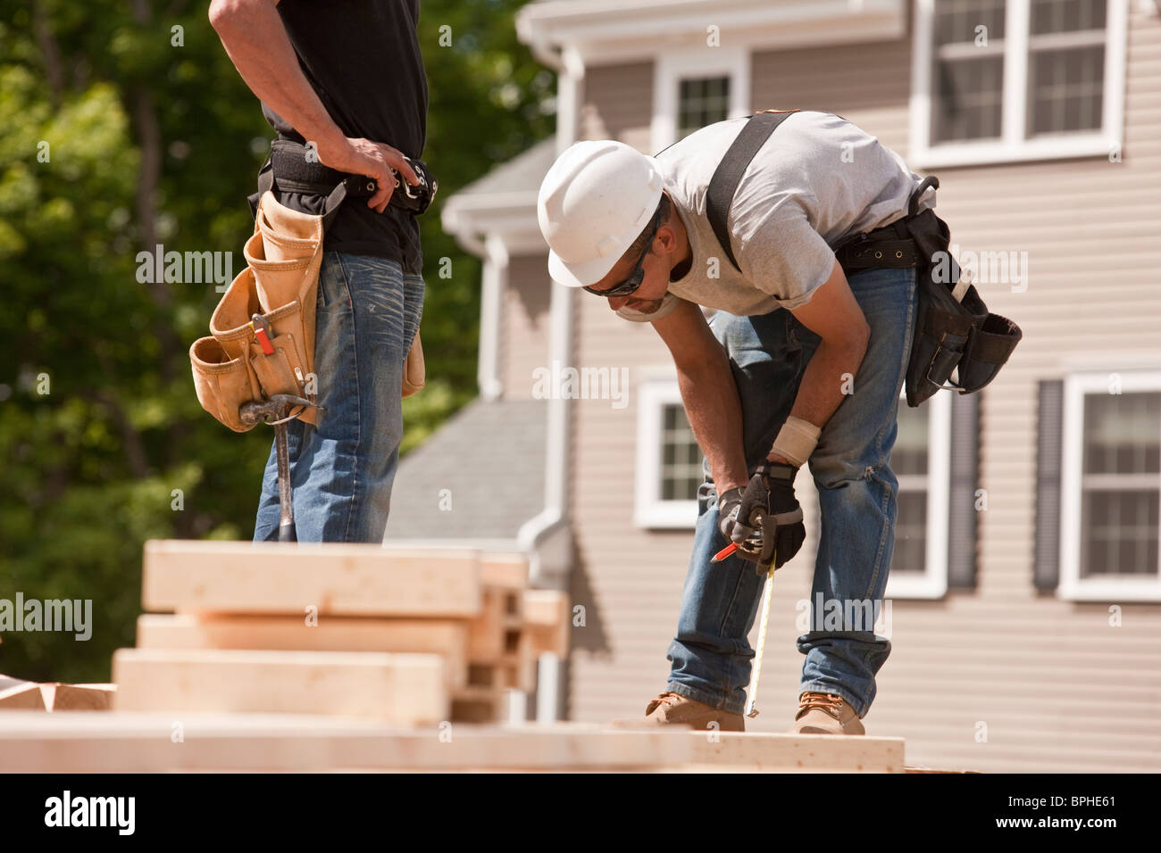 Carpenters marking studs Stock Photo - Alamy