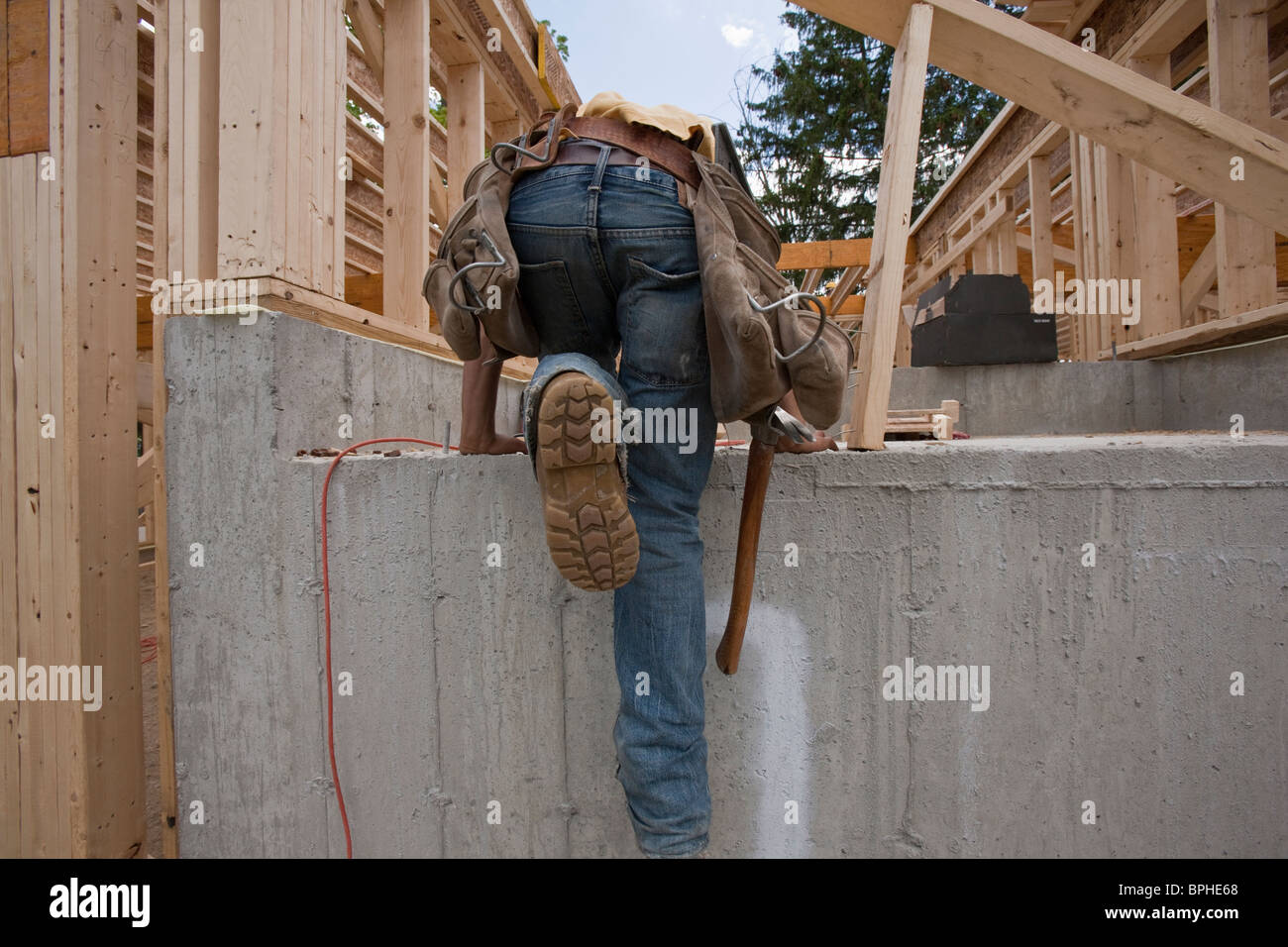 Carpenter inspecting foundation Stock Photo - Alamy