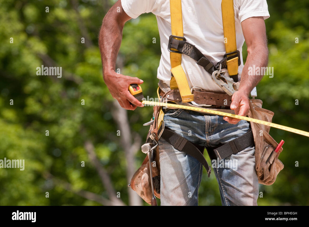 Carpenter making measurements Stock Photo - Alamy