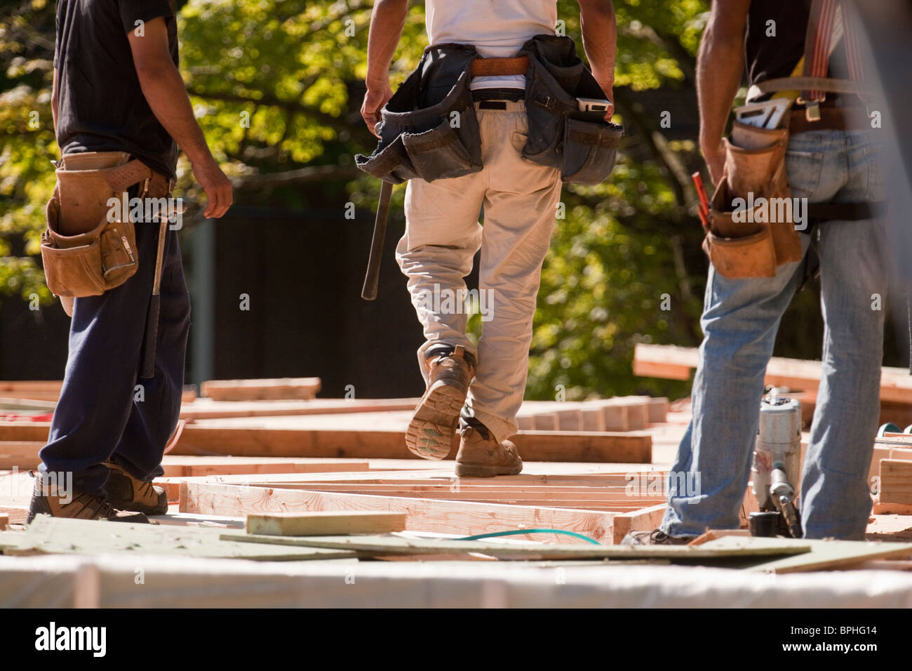 Three carpenters building house hi-res stock photography and images - Alamy