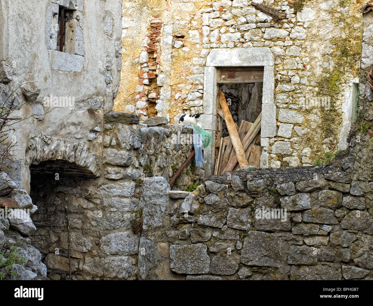 Stone ruins of an abandoned Mediterranean village Stock Photo - Alamy
