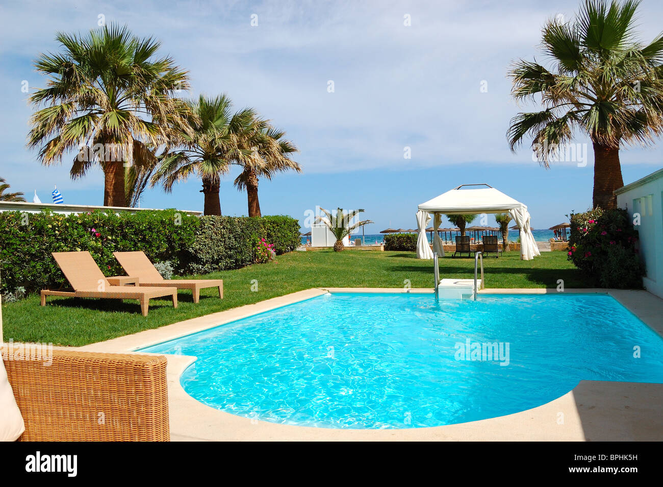 Swimming pool with jacuzzi at the beach of modern luxury villa, Crete ...