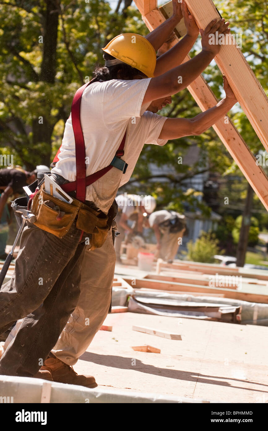 Carpenters lifting framing Stock Photo - Alamy