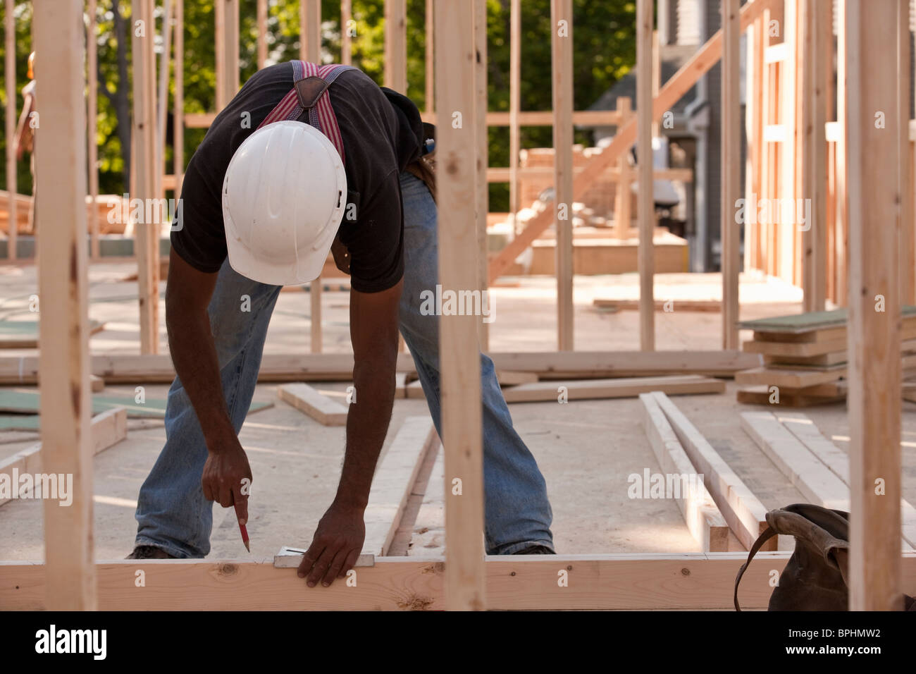Carpenter marking measurements on wood Stock Photo - Alamy