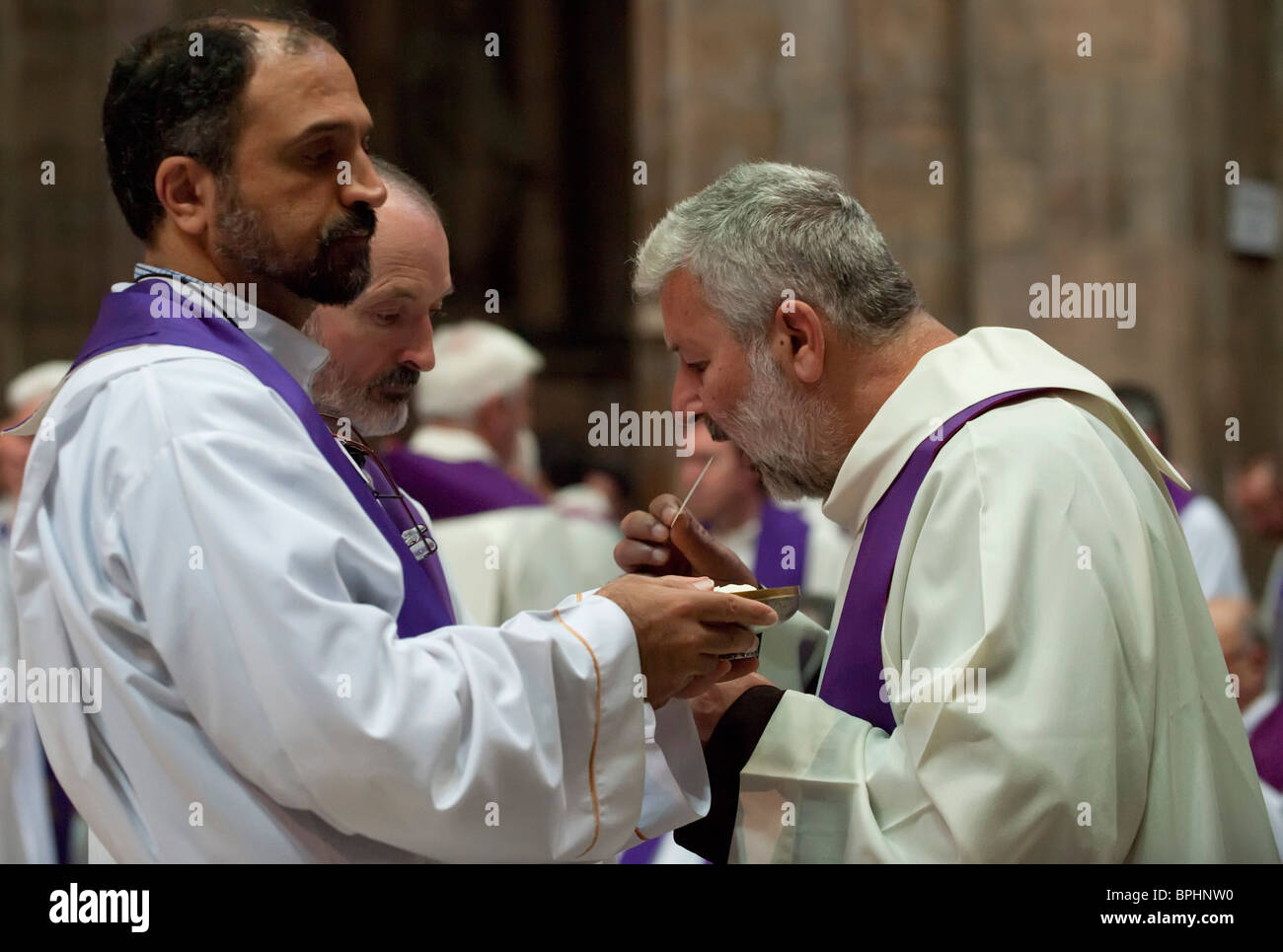 Roman catholic priest communion hi-res stock photography and images - Alamy