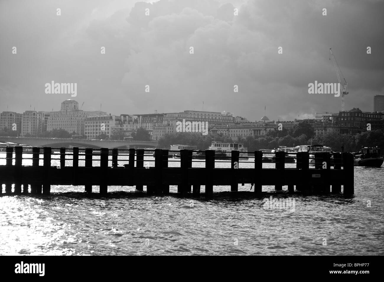 Simple pier over the River Thames, south bank, London, SE1, England ...
