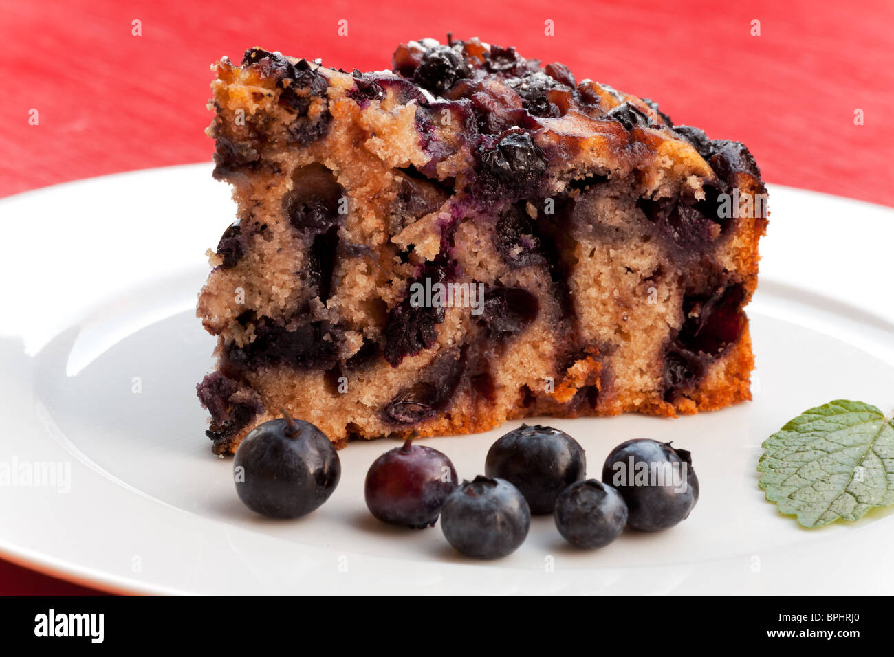 blueberry cake on a square plate Stock Photo - Alamy