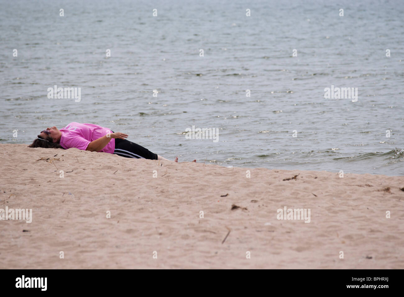 Overweight woman on a beach hi-res stock photography and images - Alamy
