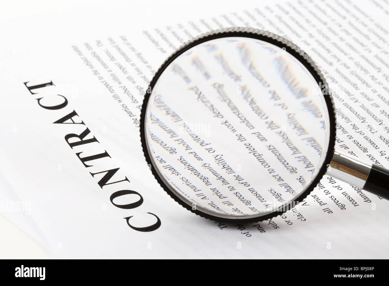 Magnifying Glass and document close up Stock Photo - Alamy