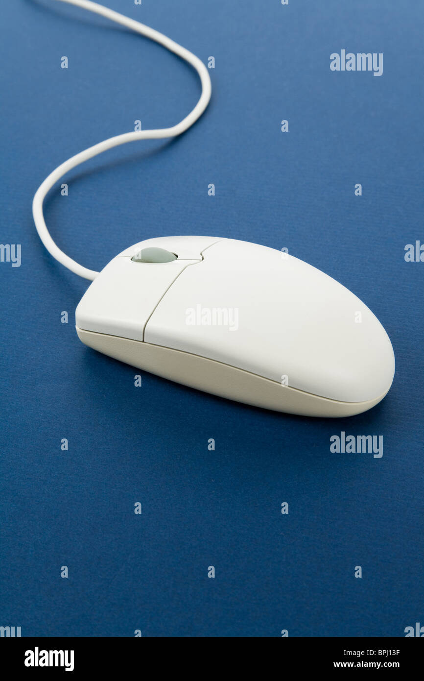 computer mouse with blue background Stock Photo - Alamy