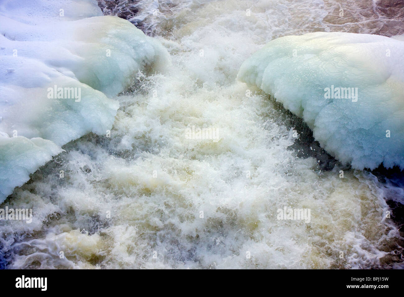 Snow and ice by a river in Sweden Stock Photo - Alamy