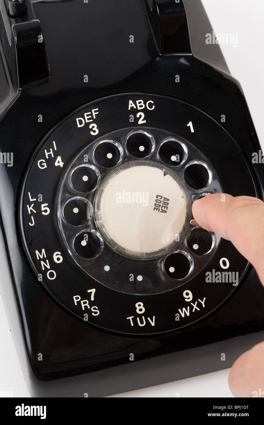 Black telephone with white background Stock Photo - Alamy